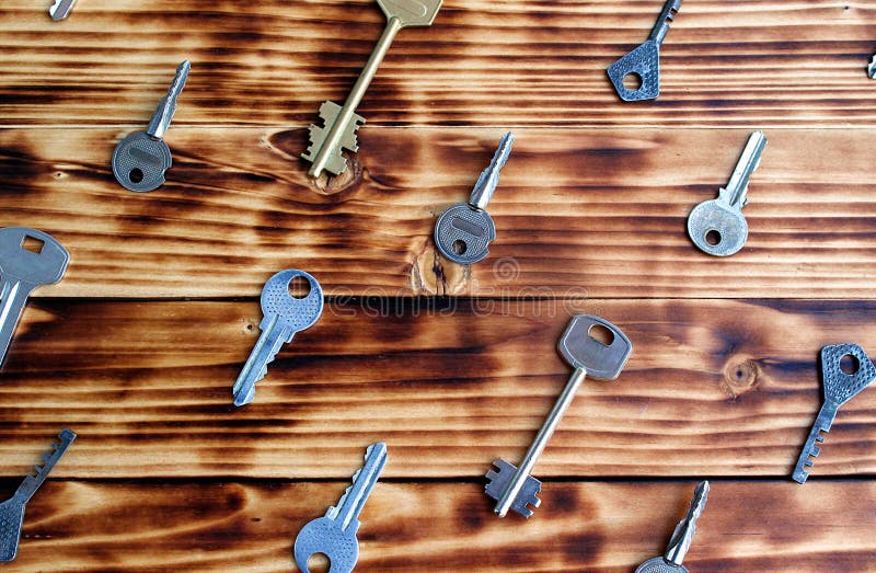 Keys of Different Types and Sizes are Laid Out on the Table Stock Photo ...