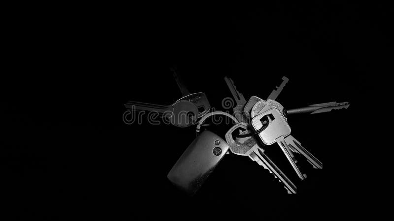 Keys and Key Chain in the Dark Stock Image - Image of keys, white ...