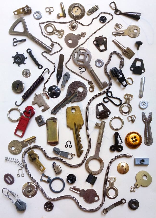 Keys, Locks, Hooks, Chains and Other Small Metallic Stuff on the White ...