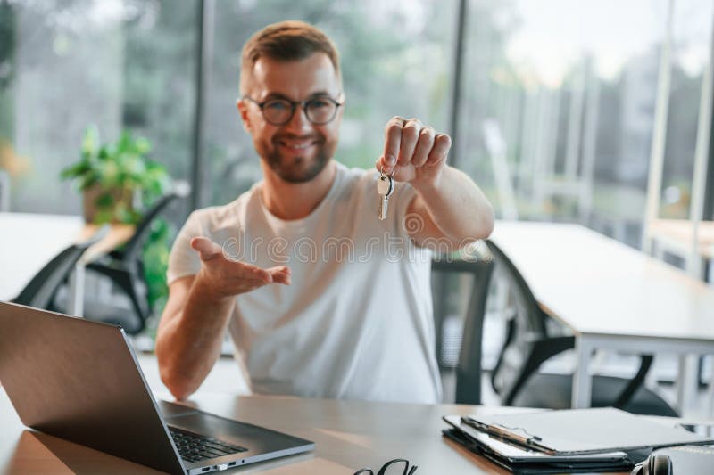 With Keys from the New House. Man in Formal Clothes is Working in the ...