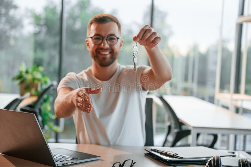 With Keys from the New House. Man in Formal Clothes is Working in the Modern Office Stock Image ...