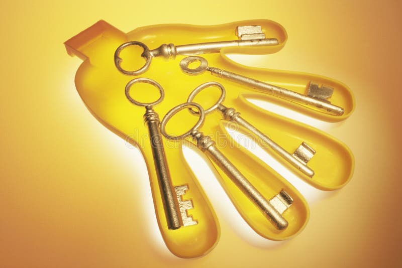Keys on Plastic Hand stock image. Image of yellow, holding - 129616361