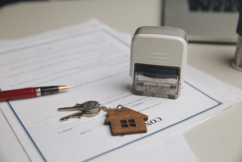 Keys on a Signed Contract of House Sale and Pen Stock Photo - Image of ...