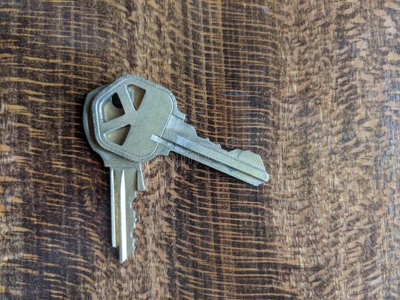 Keys on wood table stock photo. Image of sculpture, keys - 203747048