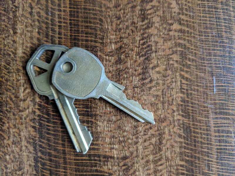 Keys on wood table stock image. Image of weapon, wing - 203746165
