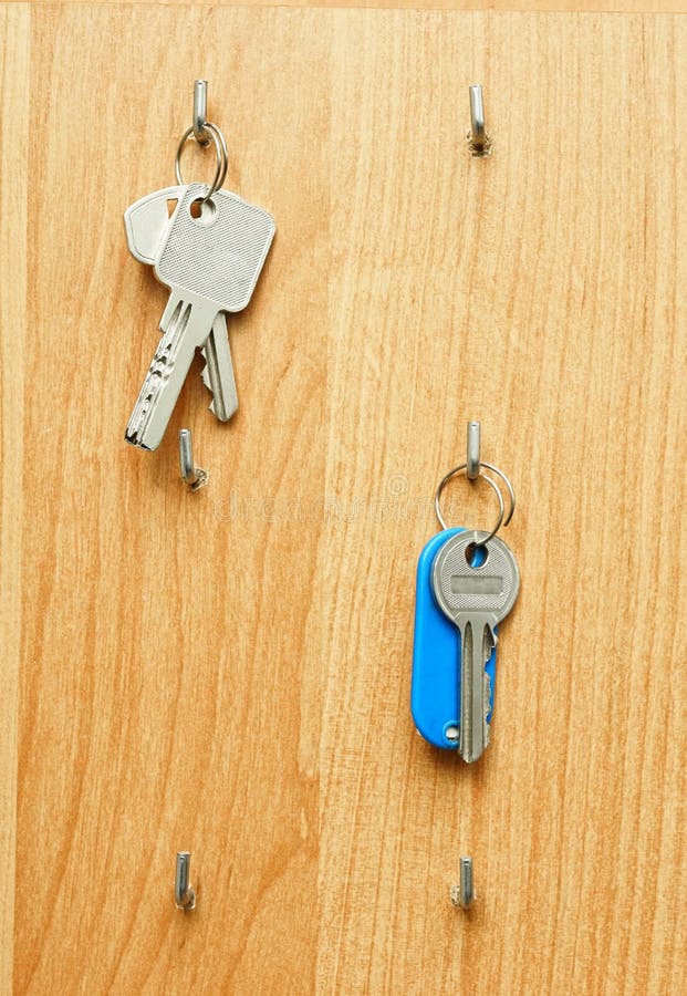 Keys on a wooden board stock photo. Image of metallic - 72416452