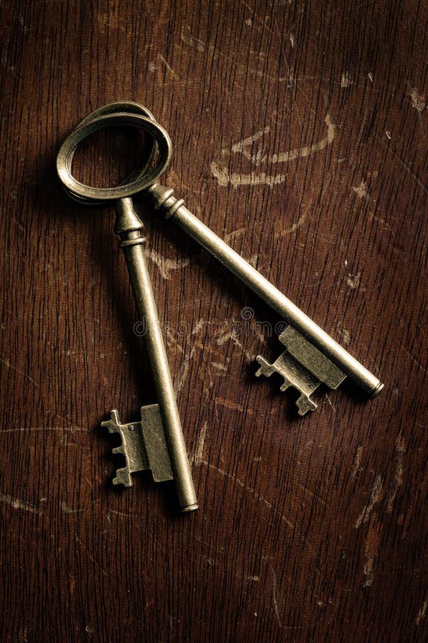 Keys on Wooden Surface To Unlock Stock Photo - Image of retro, rust ...