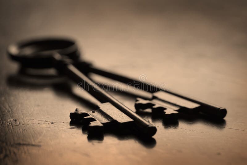 Keys on Wooden Surface To Unlock Stock Photo - Image of iron, safety ...