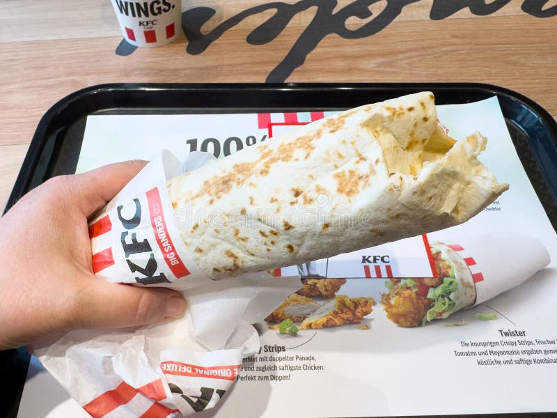 Kfc Chicken Wrap with Branded Packaging in Hand on Tray Editorial Image ...