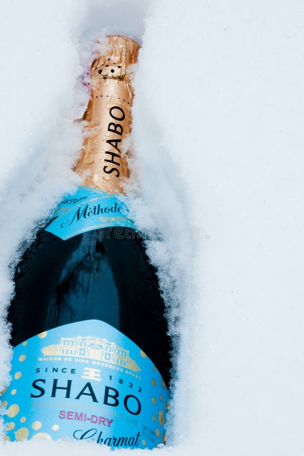 Kharkov, January 24, 2019 a Bottle of Champagne in the Snow Editorial ...