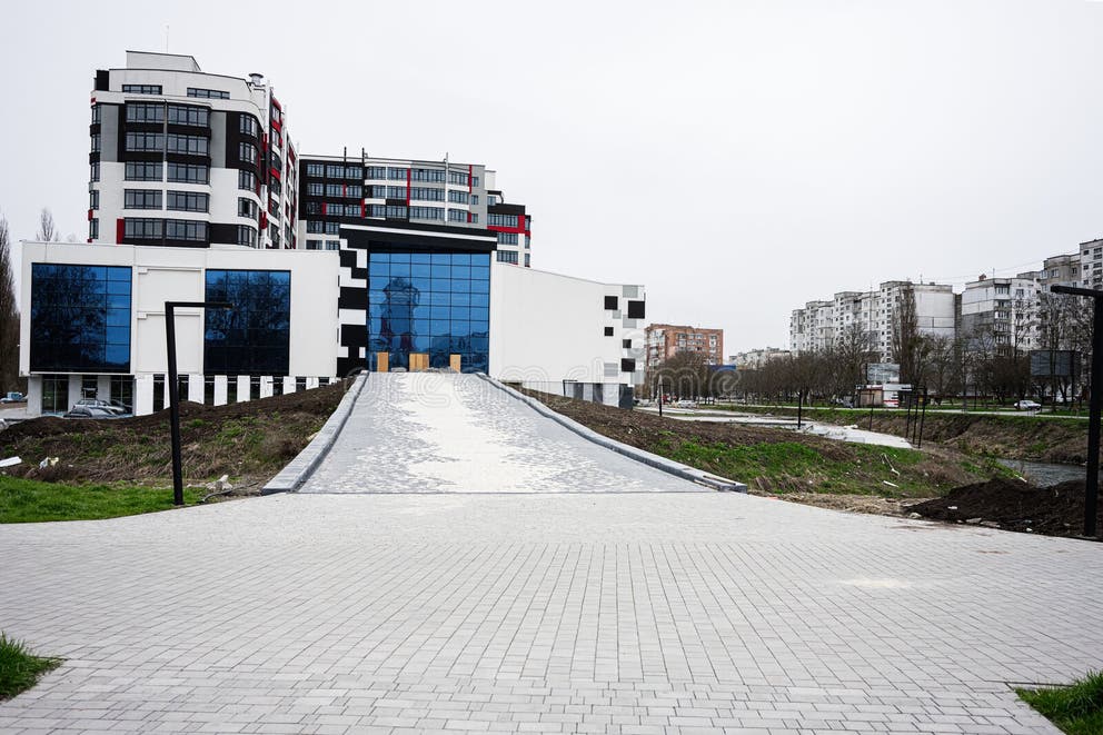 Modern Architectural Building Surrounded by Concrete and Landscaped Urban Area Editorial Stock ...