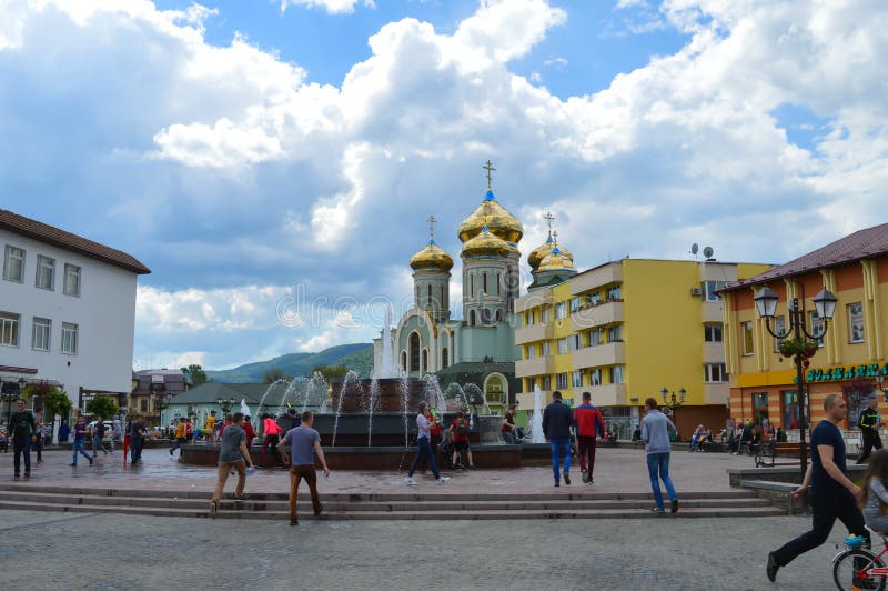 Young People Running Around a Fountain in Khust, Ukraine on May 3, 2016 ...