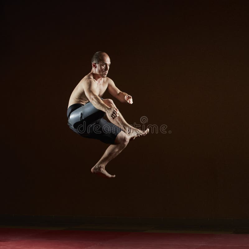 A Kick in a Jump Performed by an Athlete Stock Photo - Image of kung ...