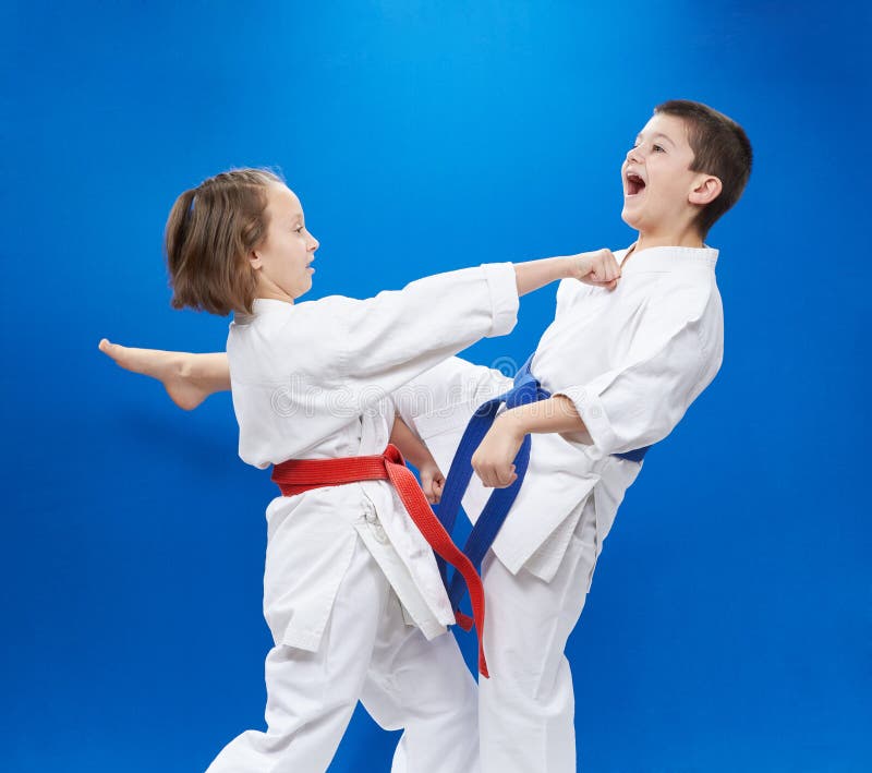 Kick Leg and Punch Arm are Beating the Little Athletes Stock Photo ...