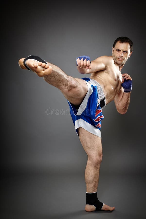 Kickbox Fighter Executing a Kick Stock Image - Image of adult, kick ...