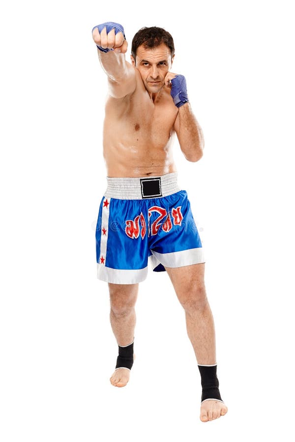 Kickboxer with punch bag stock photo. Image of kickbox - 44552066