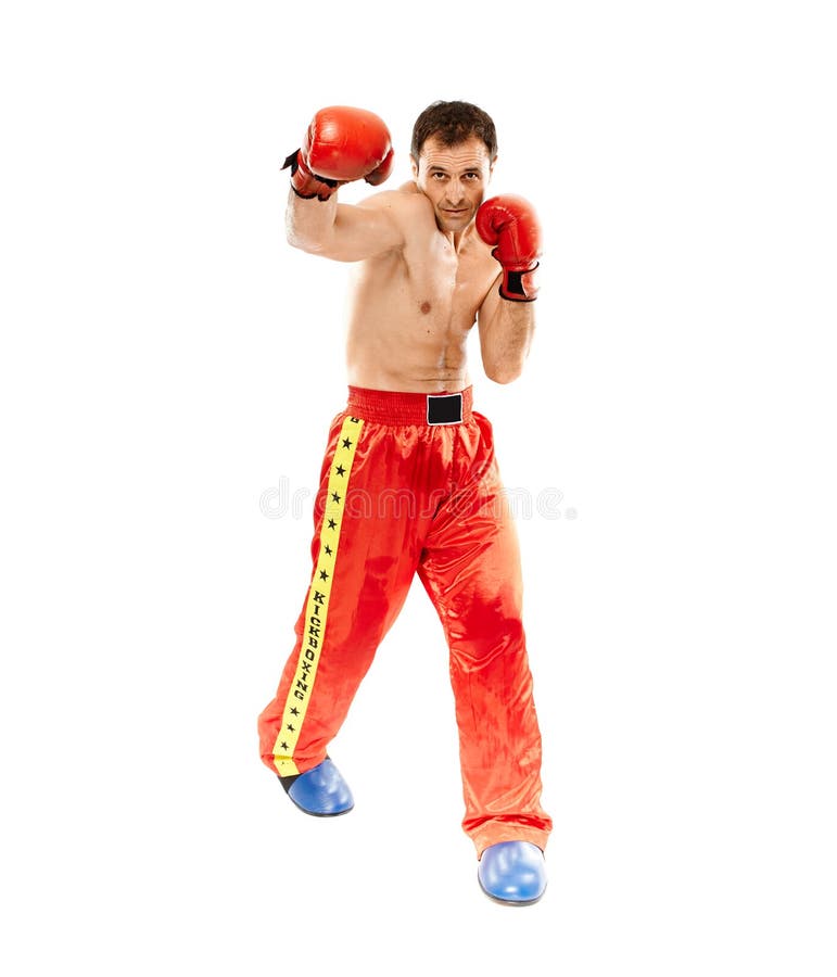 Kickboxer with punch bag stock photo. Image of kickbox - 44552066