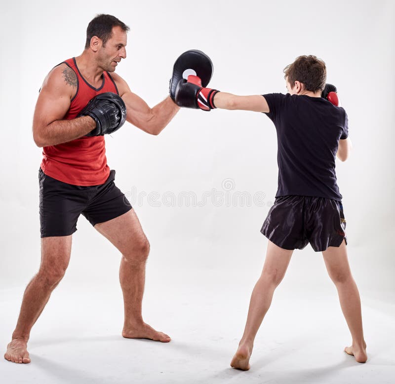 Kickboxer Kid and His Coach Stock Image - Image of pads, fighter: 133156959