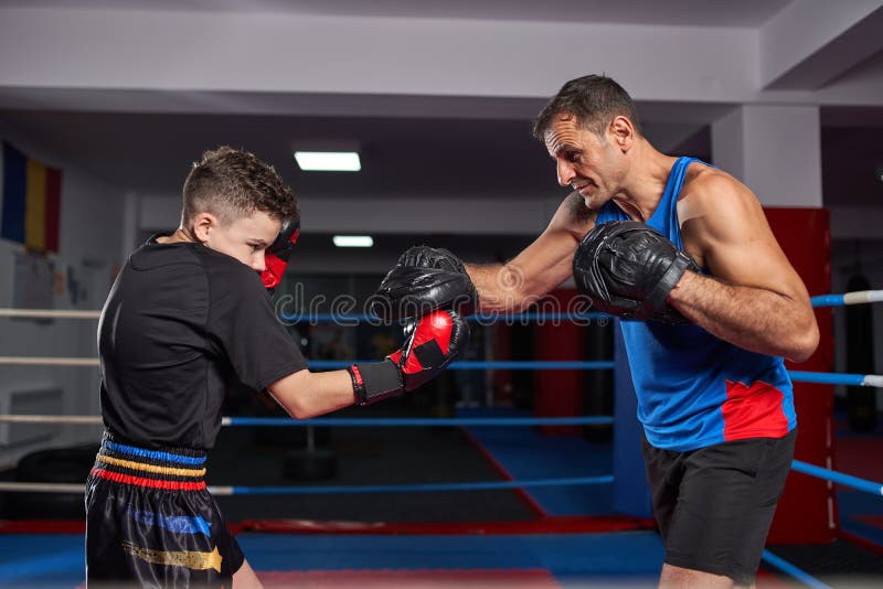 Kickboxer Kid and His Coach Stock Photo - Image of combat, exercise ...