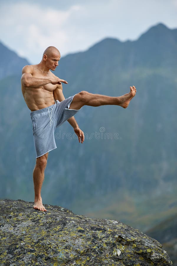 Kickboxer or Muay Thai Fighter Training on a Mountain Cliff Stock Photo ...
