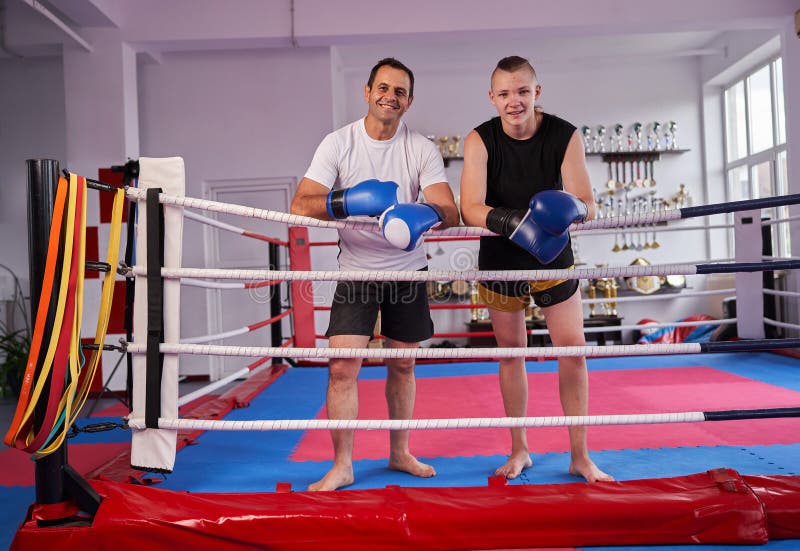 Kickboxers Posing after Sparring Stock Photo - Image of coaching, body ...