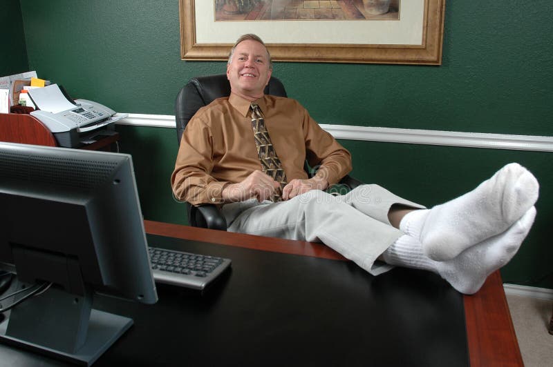 Kicking Back stock image. Image of break, brown, rest, shirt - 513675