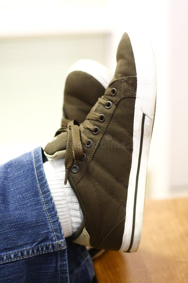 Kicking Back with Legs Crossed at Ankles Stock Photo - Image of back ...