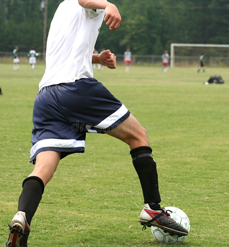 Kicking the Ball stock photo. Image of speed, strength - 2785374