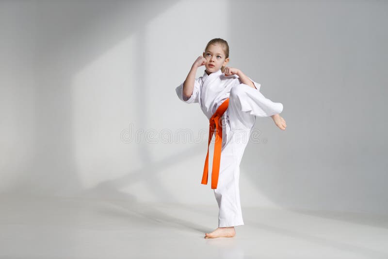 Kicking Stand, Karate Child on a White Background Stock Image - Image ...