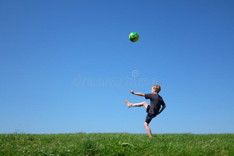 Boy Kicks Ball Park Outdoors Stock Photos - Free & Royalty-Free Stock ...