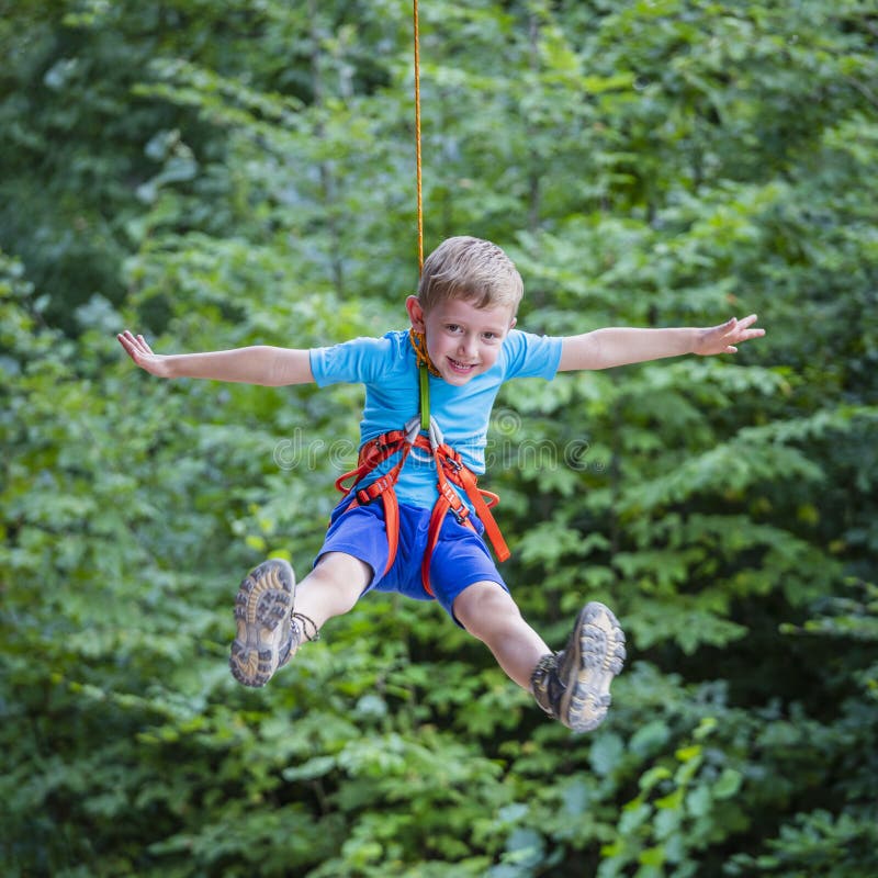 Kid in adventure park stock photo. Image of adventure - 124794786