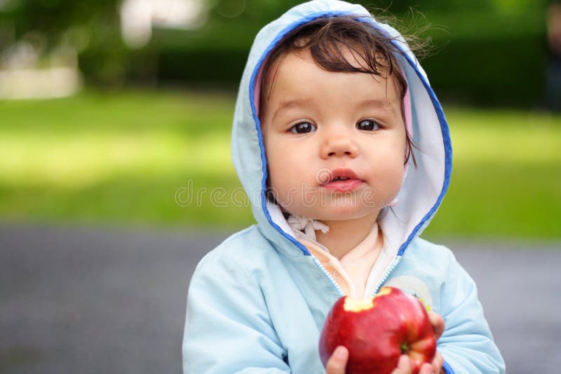 Kid with apple stock image. Image of casual, beauty, beautiful - 15121757