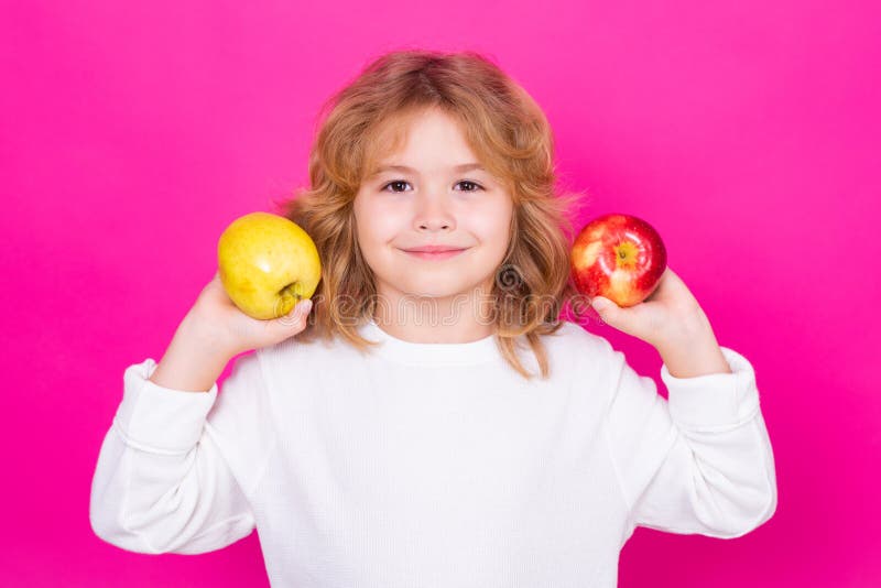 Kid with Apple in Studio. Studio Portrait of Cute Child Hold Apple ...