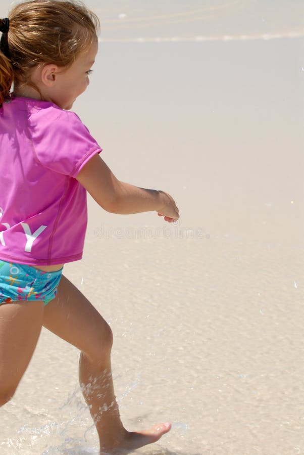 Kid on beach stock photo. Image of wave, blue, smile, water - 6320078