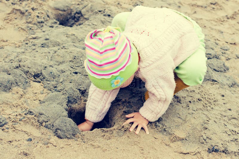 101 Digging Hand Sand Beach Stock Photos - Free & Royalty-Free Stock ...