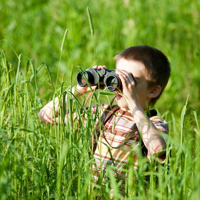Boy Using Binoculars stock photo. Image of male, happiness - 1212234