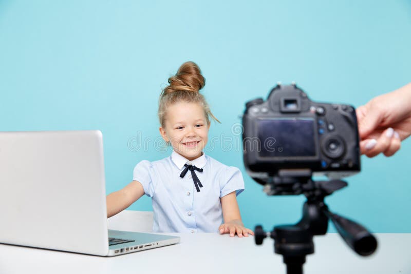 Kid Blogger Filming Video on Camera Working with the Laptop. Stock ...