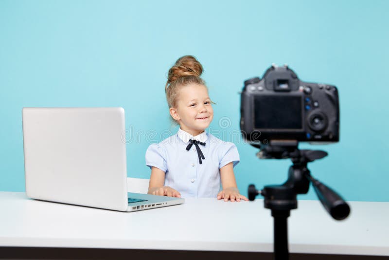Kid Blogger Filming Video on Camera Working with the Laptop. Stock ...