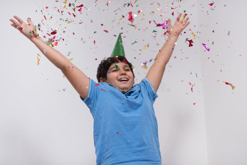 Kid blowing confetti stock photo. Image of lifestyle - 91362922