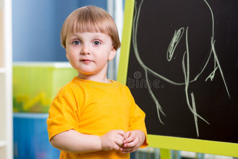 Kid Boy Chalk Drawing on Blackboard Stock Photo - Image of elementary ...