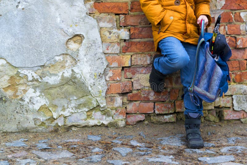 Kid Boy Legs and Backpack Against Wall Stock Image - Image of foot ...