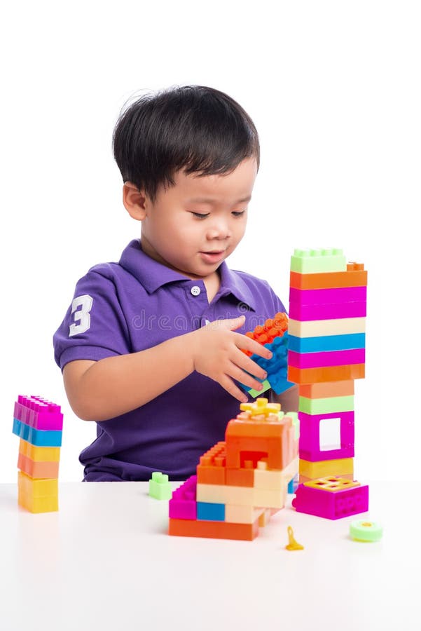 Kid Boy Playing with Blocks from Toy Constructor Isolated Stock Photo ...