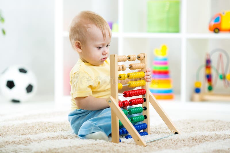 Kid Boy Playing with Counter Stock Photo - Image of calculator ...
