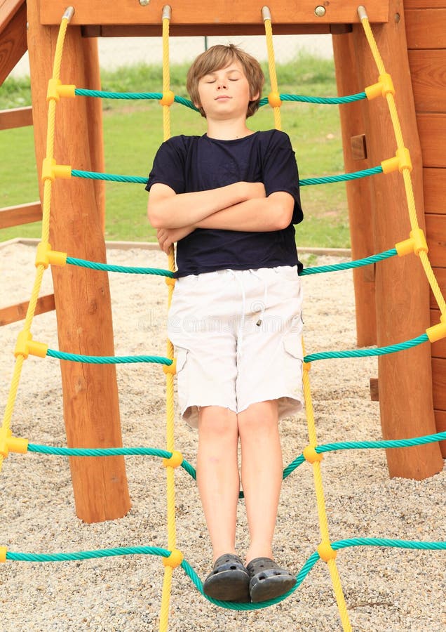 Kid - Boy Sleeping on Net Ladder Stock Image - Image of playground ...