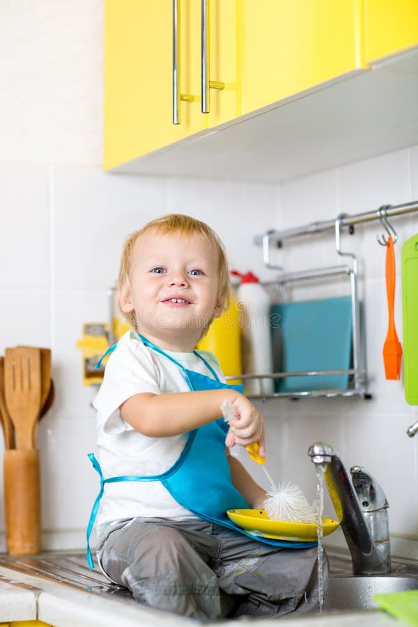 Kid Boy Washing Dishes and Having Fun in the Stock Image - Image of ...