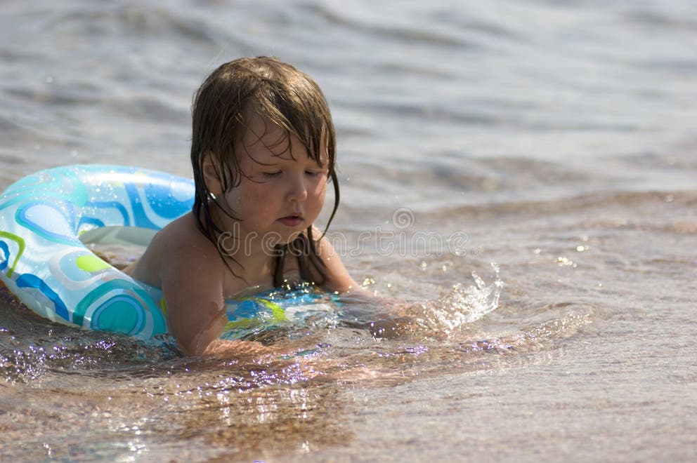 Kid in Buoy Playing with Sand Stock Image - Image of contemplation ...