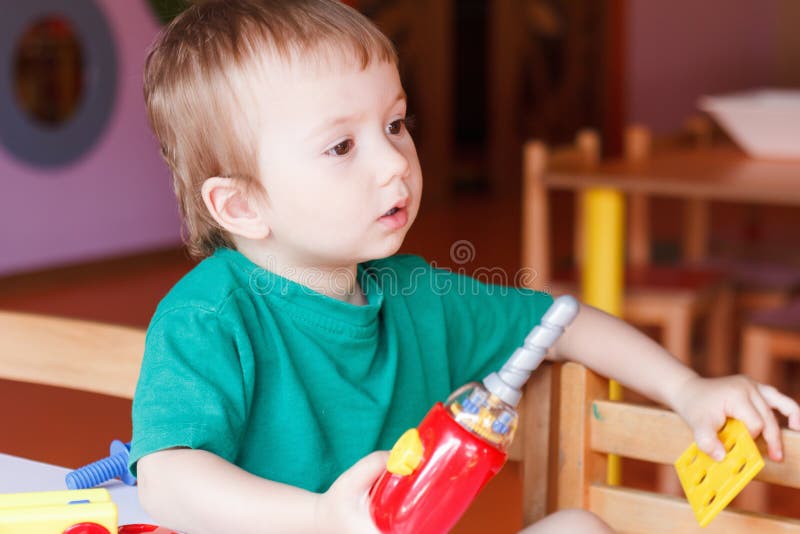 Kid Child Boy Playing with Toys Stock Image - Image of building, cute ...