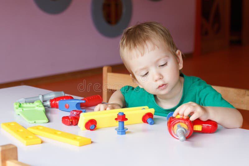 Kid Child Boy Playing with Toys Stock Photo - Image of construction ...
