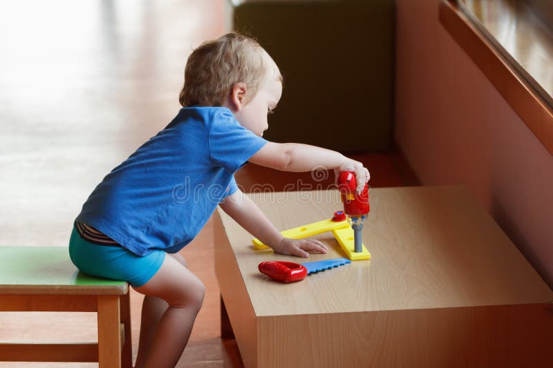 Kid Child Boy Playing with Toys Stock Image - Image of little ...