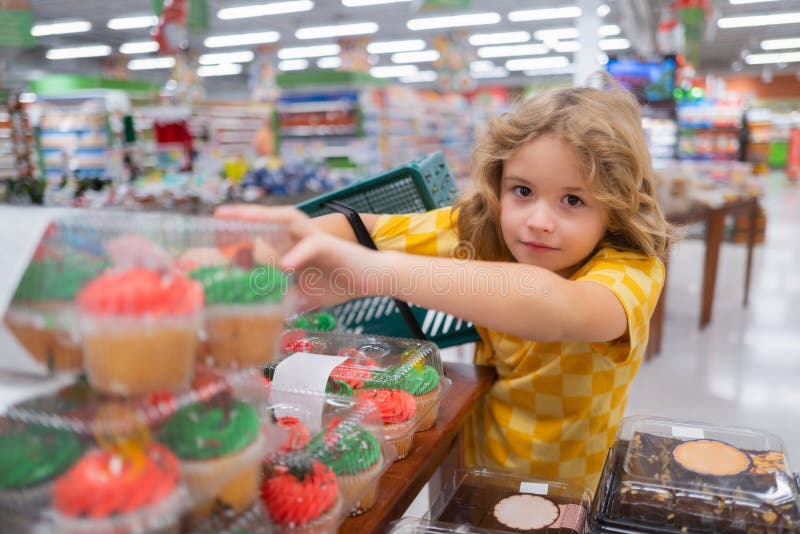 Kid Choosing Cakes, Cupcake Muffin. Little Kid Going Shopping. Stock ...
